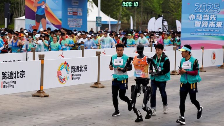 Humans race against humanoid robots in bizarre half-marathon